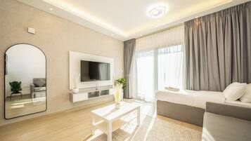 Apartamento, varanda, Vista para a cidade | Sala de estar