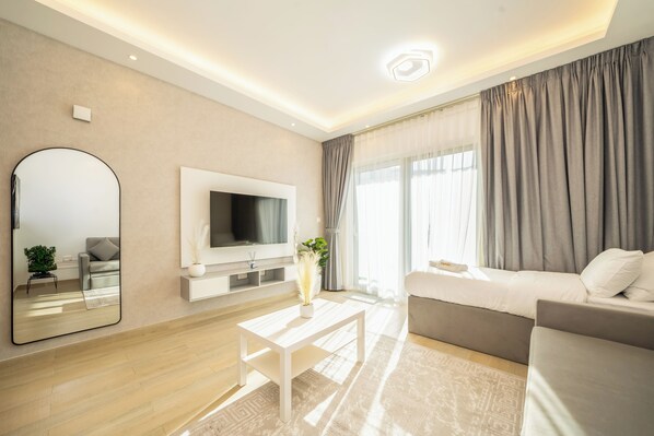 Apartamento, sacada, vista para a cidade | Área de estar