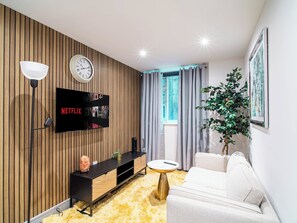 Apartamento | Sala de estar | Televisor 