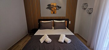 Apartamento, vista para o jardim | 1 quarto, quartos insonorizados, ferro/tábua de engomar, Wi-fi grátis 