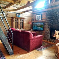 Cabana, 2 quartos | Área de estar | Smart TV