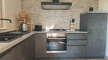 Casa | Cozinha privada | Uma cadeira de bebé