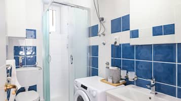 Apartamento luxo, vista para a cidade | Banheiro