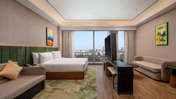 Quarto Deluxe, 1 cama king-size | Cofre no quarto, secretária, quartos insonorizados, Wi-fi grátis