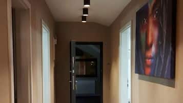 Apartamento Deluxe | 2 quartos, cofre no quarto, secretária