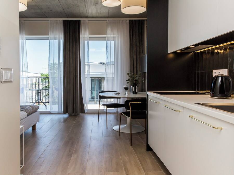 Suite-Estúdio, varanda | Kitchenette privada | Um frigorífico, uma placa de cozinha, uma máquina de lavar louça