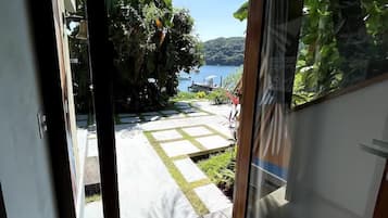 Quarto casal luxo, vista para o mar | Cofres nos quartos, cortinas blackout, Wi-Fi de cortesia, roupa de cama