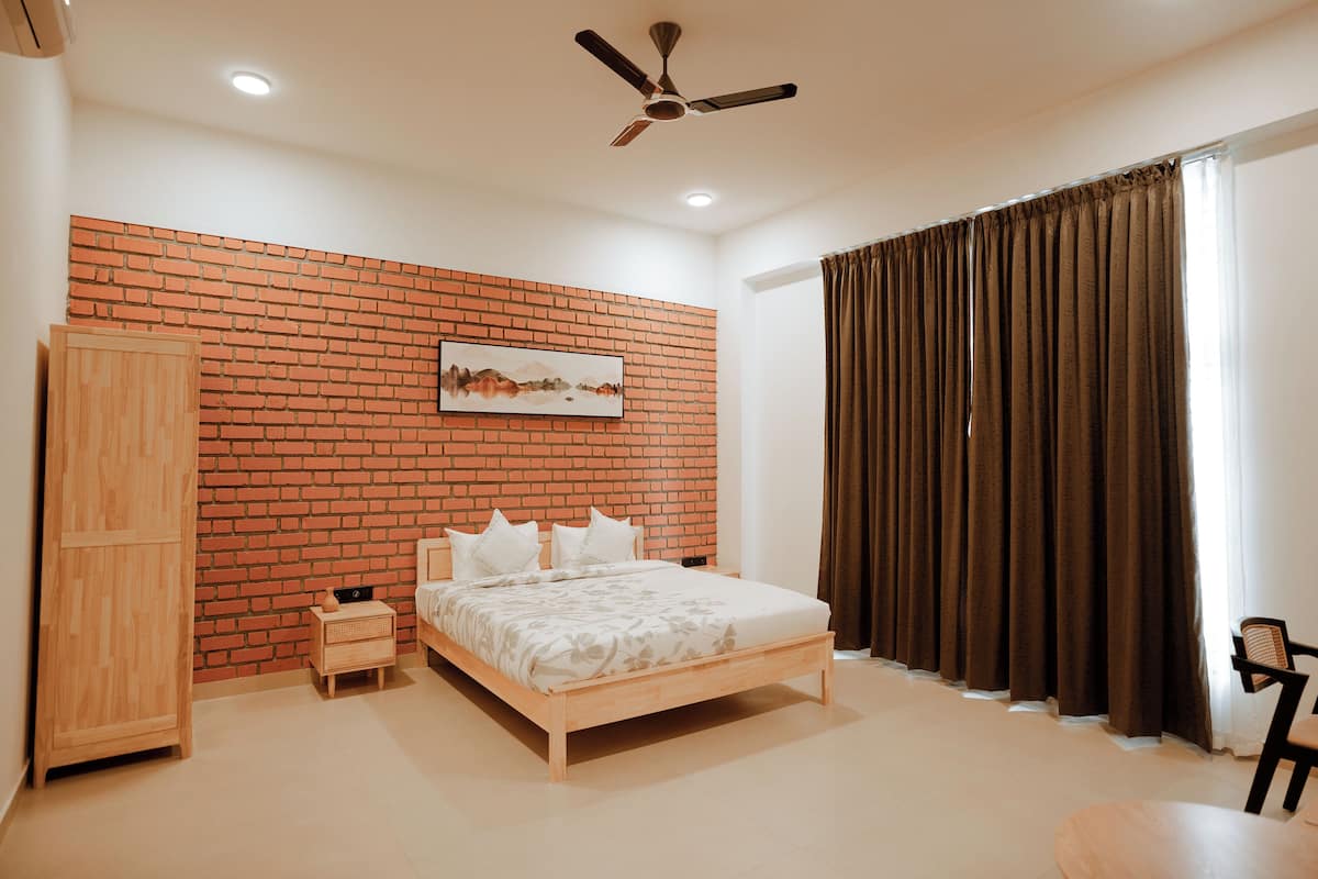 Apartamento família, vista para o jardim | Roupas de cama premium, edredons de pluma