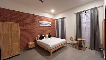 Apartamento Superior, vista para o jardim | Ferro/tábua de engomar, Wi-fi grátis