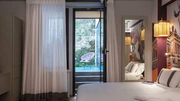 Quarto triplo luxo, vista para o jardim | Frigobar, cofres nos quartos, cortinas blackout, Wi-Fi de cortesia