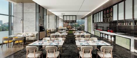 Uma zona de refeições moderna, com mesas, cadeiras, bancada de cozinha e grandes janelas com vista para a cidade.