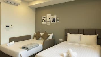 Apartamento família, 1 cama Queen e sofá-cama | 1 quarto, roupas de cama antialérgicas, espaço de trabalho para notebook