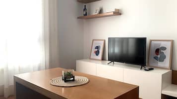 Apartamento | Sala de estar | Televisor