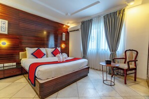 Quarto superior | Roupas de cama premium, frigobar, escrivaninha, cortinas blackout