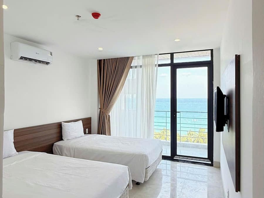 Quarto Quádruplo Deluxe | Cofre no quarto, cortinas/cortinados opacos, quartos insonorizados