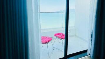 Apartamento Familiar, vista para a praia | Varanda