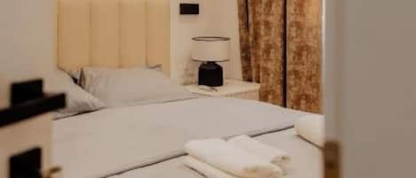 Quarto básico | 1 quarto, Wi-Fi de cortesia, roupa de cama