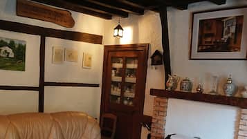 Casa, 2 quartos, vista para o jardim | Sala | Livros