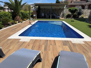 Piscina exterior sazonal 