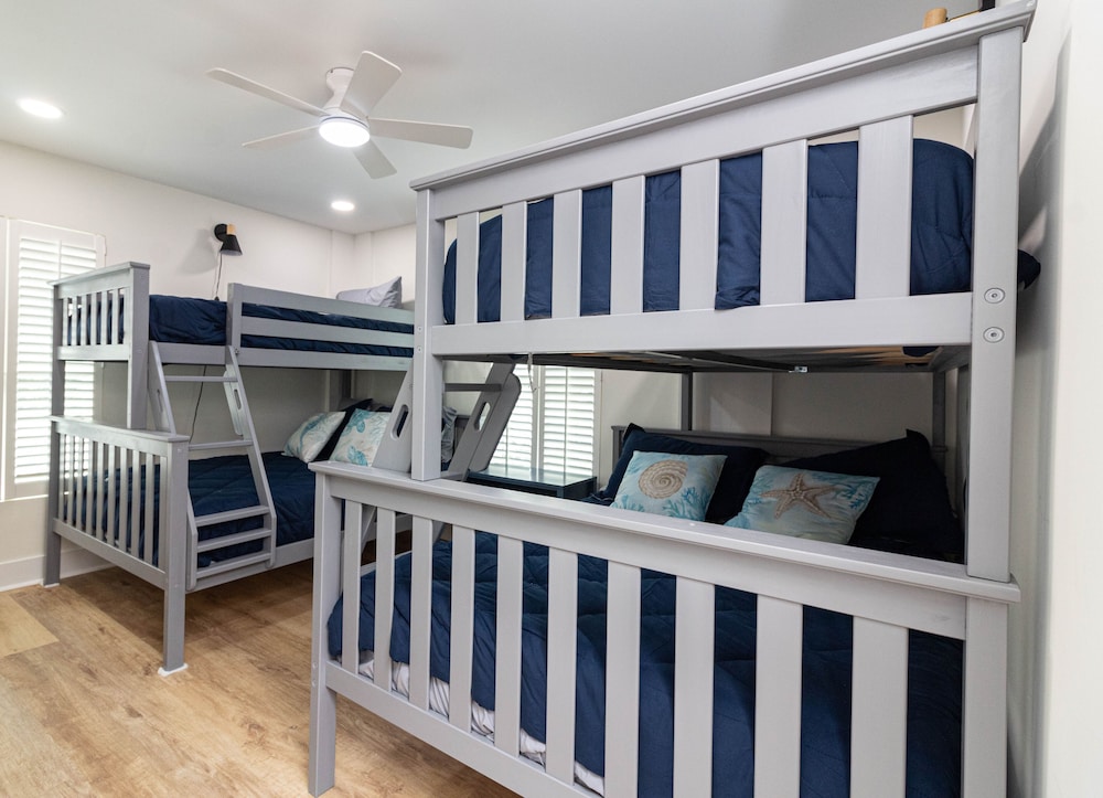 Luxurious 4-BR Beachfront Escape: Private Beach, Fishing Dock, Boat ...