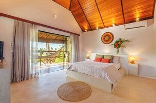 Suíte standard, 1 quarto, varanda coberta, vista para o jardim | Quartos à prova de som