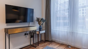 Apartamento Deluxe | Sala de estar