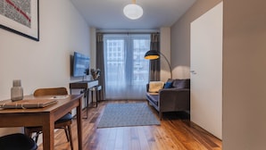 Apartamento Deluxe | Sala de estar