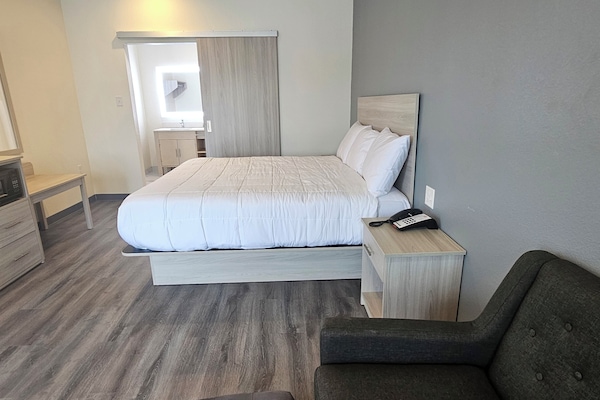 Quarto solteiro, 1 cama King, para não fumantes | Wi-Fi de cortesia