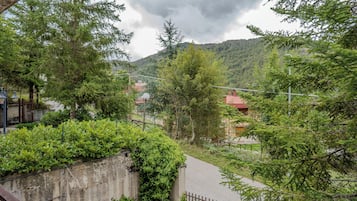 Apartamento, sacada, vista para o jardim | Sacada