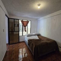 Apartamento família, 2 quartos, vista para o pátio | 2 quartos, roupas de cama premium, Wi-Fi de cortesia, roupa de cama