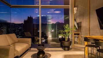 Apartamento superior, vista para a cidade | Ărea de estar