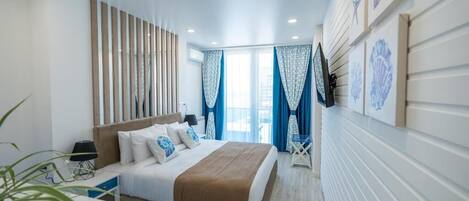 Minibar, ferro/tábua de engomar, roupa de cama fornecida