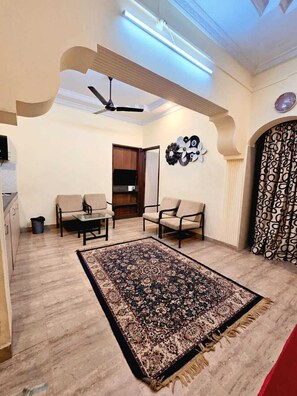 Apartamento superluxo, vista para a cidade | Área de estar