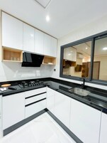 Apartamento Deluxe | Kitchenette privada
