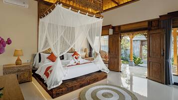 Villa, vista para o jardim | 1 quarto, minibar, Wi-fi grátis, roupa de cama fornecida