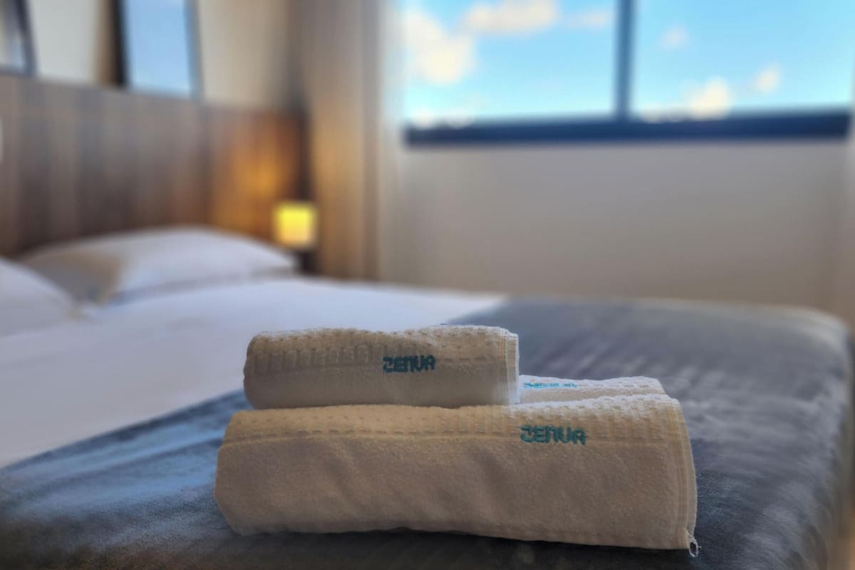 Apartamento Deluxe | Cortinas/cortinados opacos, Wi-fi grátis, roupa de cama fornecida