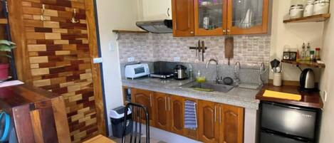 Quarto, 1 quarto, sacada, vista para a cidade | Parte interna