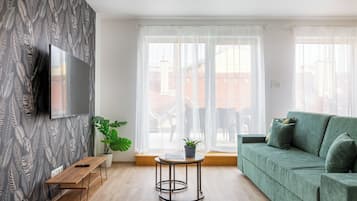 Apartamento luxo, 2 quartos, sacada | Área de estar
