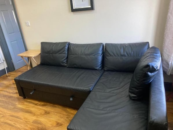 Apartamento | Sala de estar | TV de ecrã plano