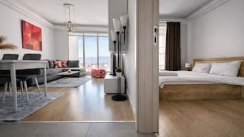 Apartamento Deluxe, varanda, Vista para a cidade | 1 quarto, ferro/tábua de engomar, Wi-fi grátis