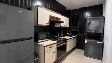 Apartamento, várias camas | Cozinha privada | Uma torradeira