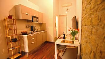 Apartamento superluxo, cozinha americana | Cozinha privada | Geladeira grande, micro-ondas, fogão, cooktop