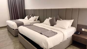 Quarto Twin Deluxe | Cofre no quarto, secretária, quartos insonorizados, Wi-fi grátis