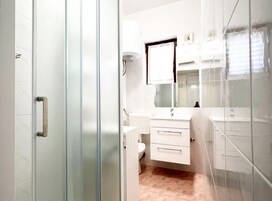 Apartamento | Casa de banho | Um secador de cabelo