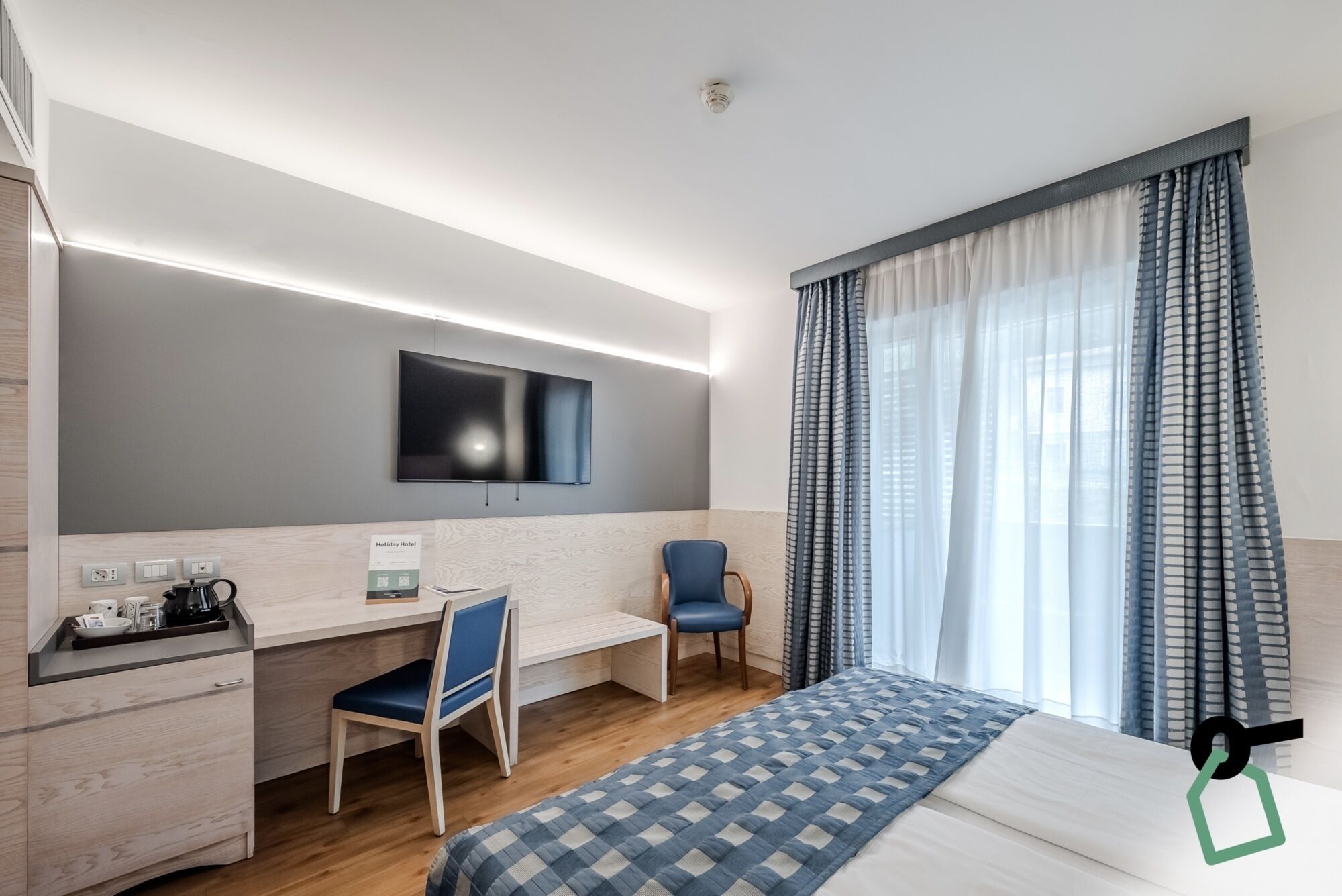 Quarto casal ou duplo conforto, para não fumantes | Frigobar, escrivaninha, espaço de trabalho para notebook