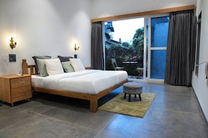 Quarto luxo, sacada, vista para o jardim | 1 quarto, Wi-Fi de cortesia