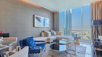 Apartamento Premium, Vista para a cidade | Sala | Smart TV de 55 polegadas com canais via satélite