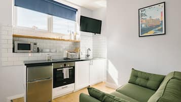 Estúdio | Cozinha privada | Frigobar, micro-ondas, torradeira