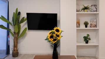 Estúdio Standard | Sala de estar | TV de ecrã plano