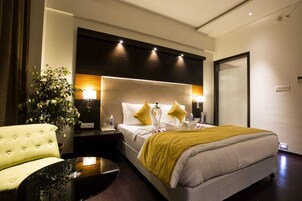 Suíte premium, vista para a cidade | 1 quarto, escrivaninha, espaço de trabalho para notebook